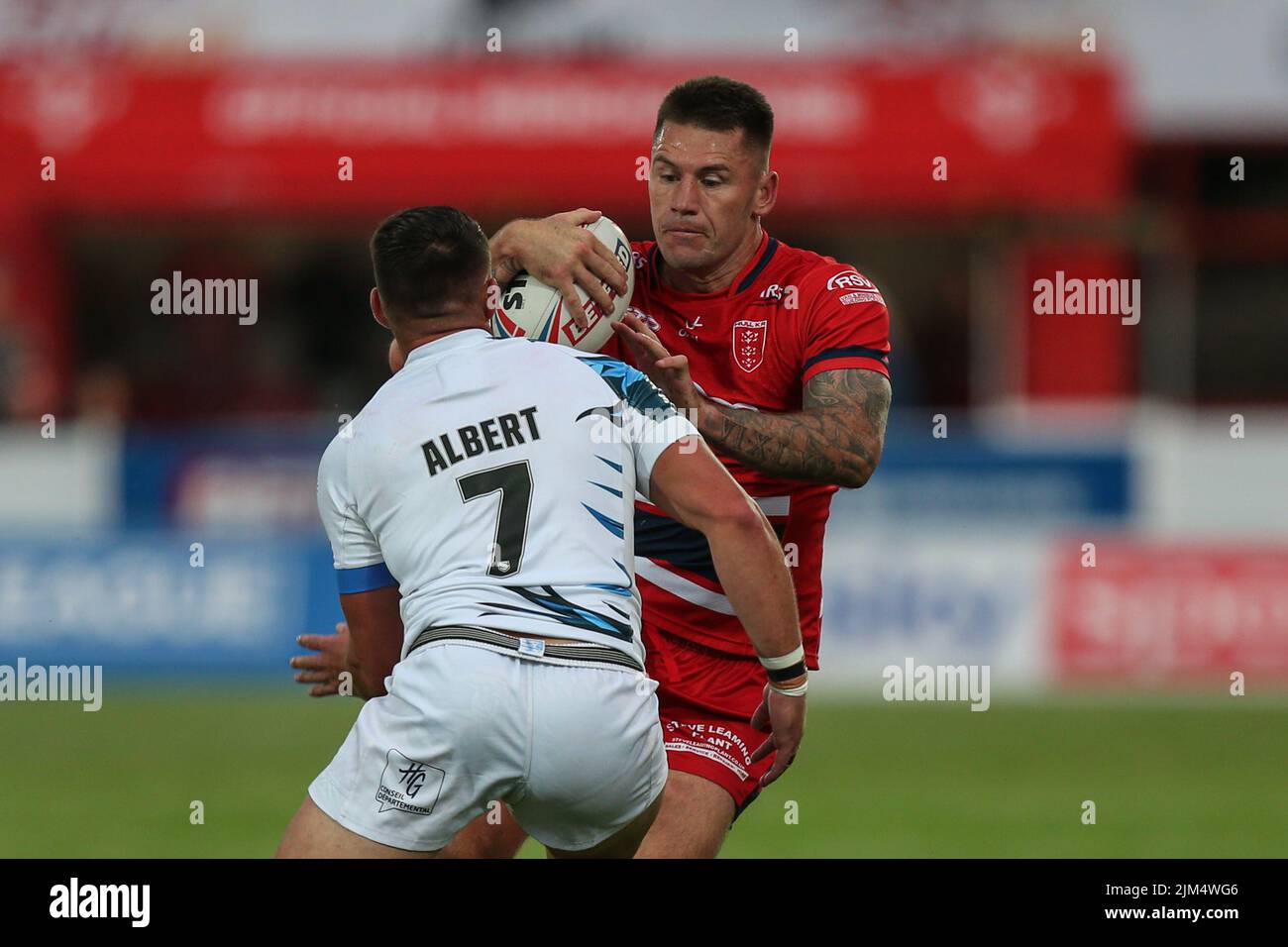 Shaun Kenny-Dowall #4 of Hull KR runs at Lucas Albert #7 of Toulouse ...