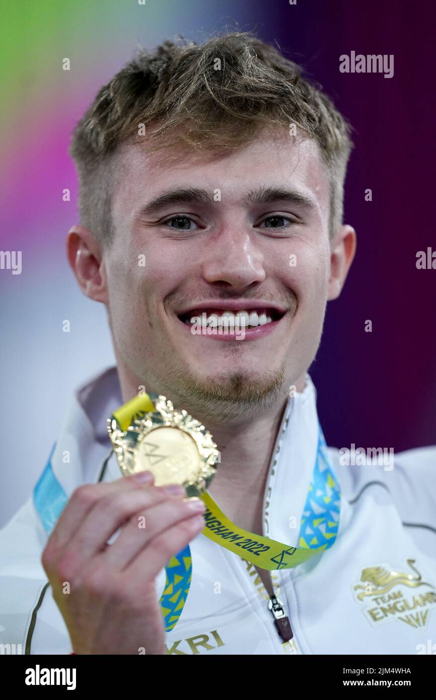 England’s Jack Laugher with his Gold Medal after the Men’s 1m ...