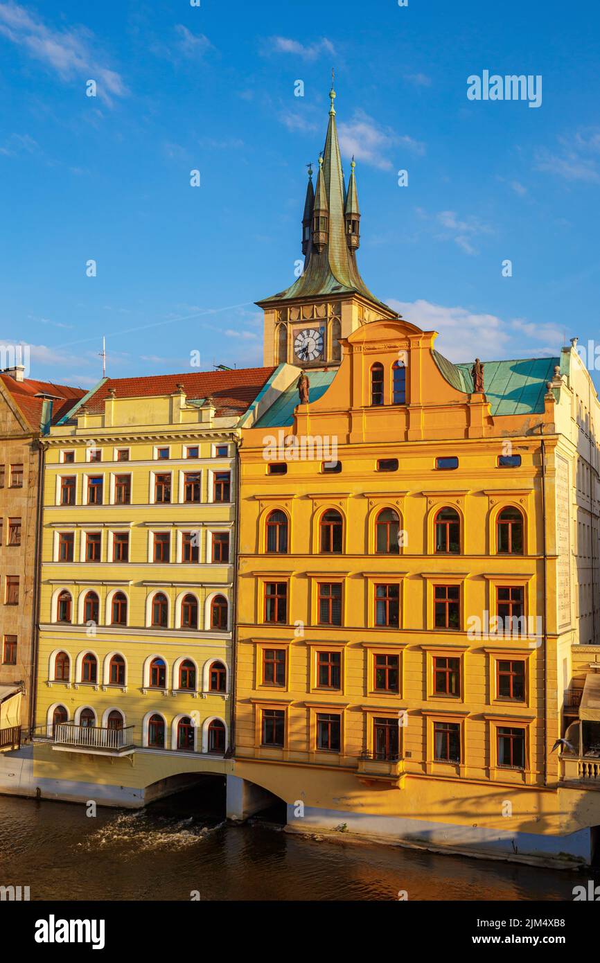 A vertical closeup of old beautiful buildings under sun in Prague Czech ...