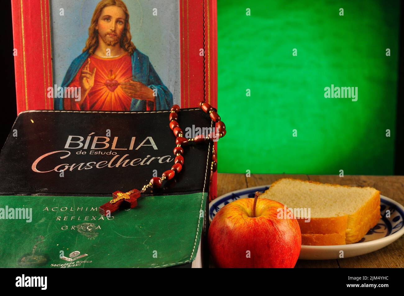 Bible, symbol of the christianism on the table Stock Photo - Alamy