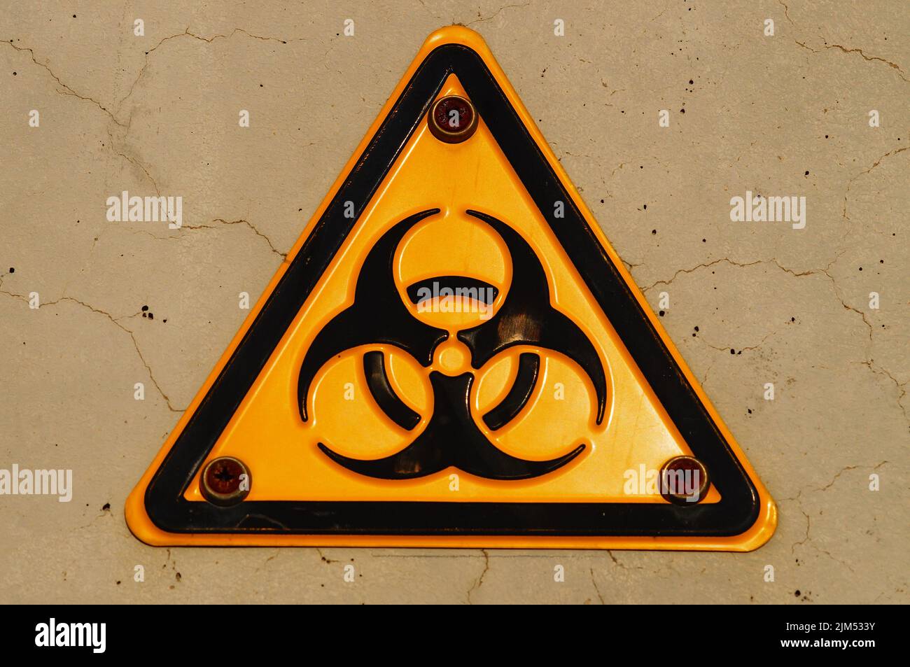 Warning sign of biological danger in front of a laboratory at the ...