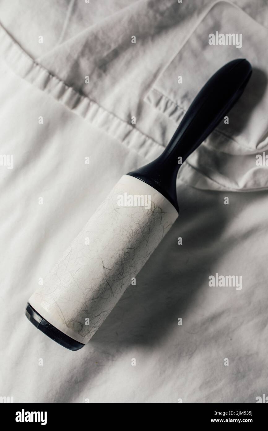 Lint roller hi-res stock photography and images - Alamy