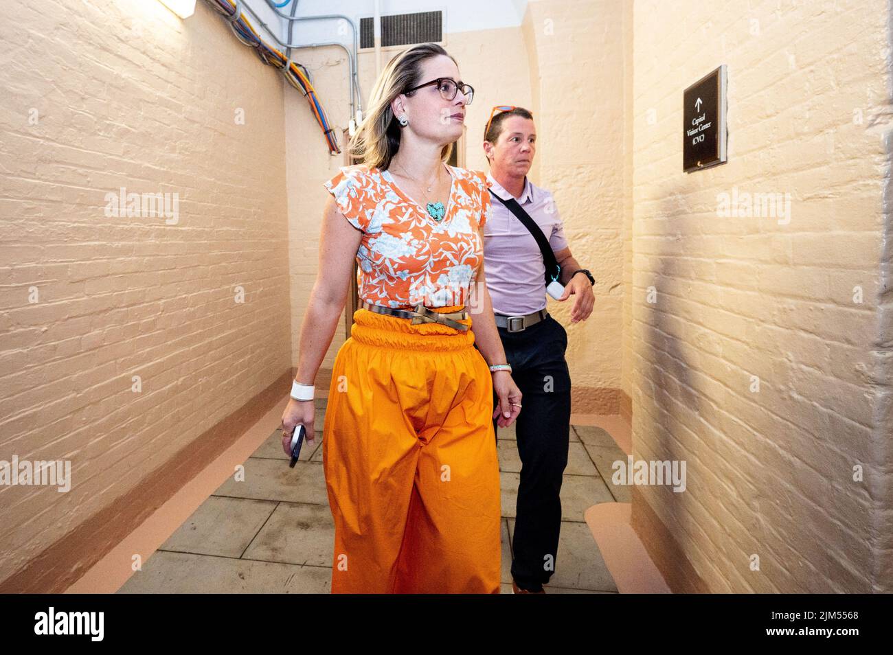 U.S. Senator Kyrsten Sinema (D-AZ) walking in the basement of the U.S ...