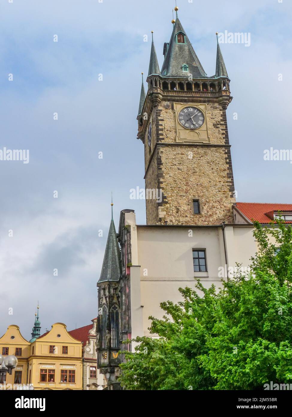 A vertical shot of the Old Town Hall tower in Prague, Czech Republic in ...