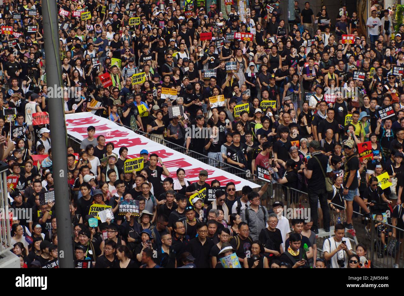 A lot of protesters in Hong Kong protest from the streets outside and ...