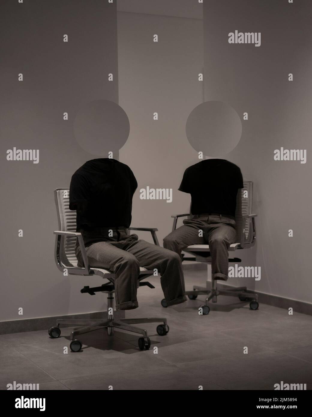 A 3d render design of two black t shirts and gray pants sitting on ...