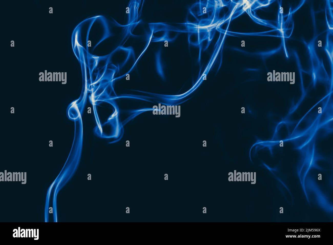 An abstract background with blue smoke Stock Photo - Alamy