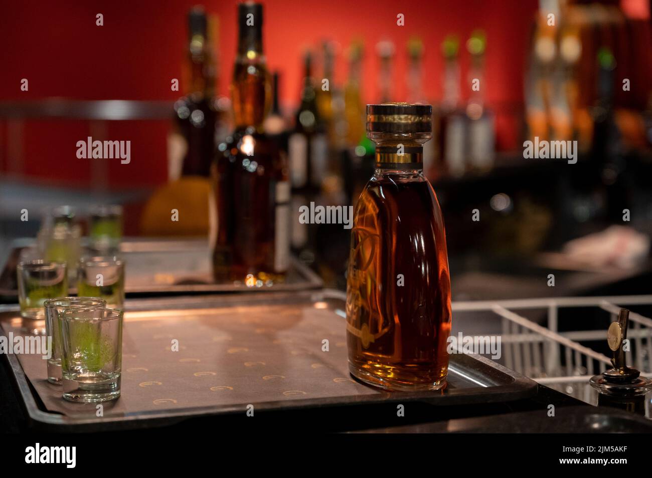 Different ages and colours of strong alcoholic apple drink calvados in ...