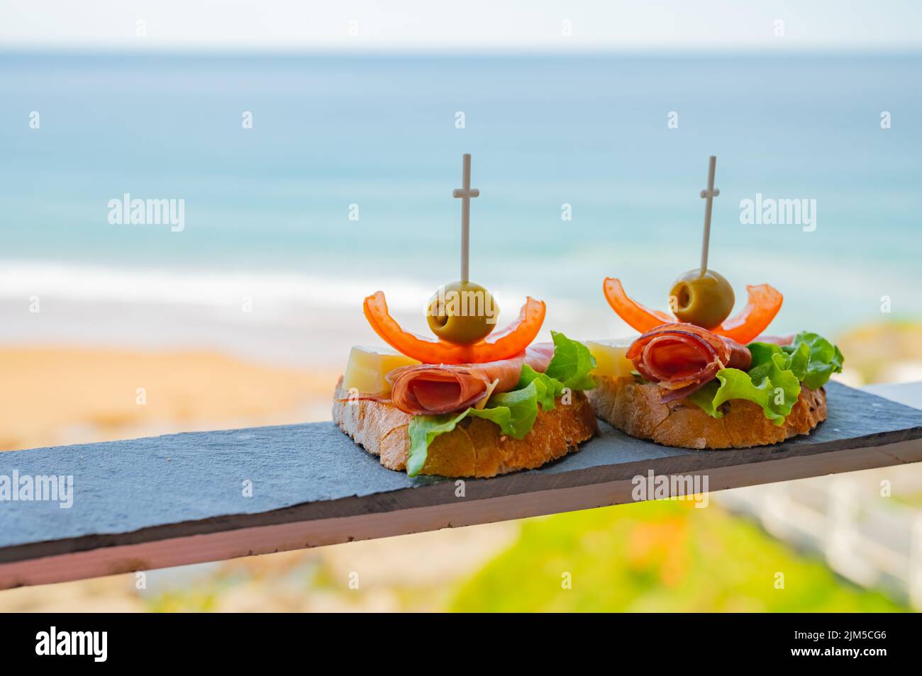 Typical snacks of Basque Country and Navarre, pinchos or pinxtos on ...