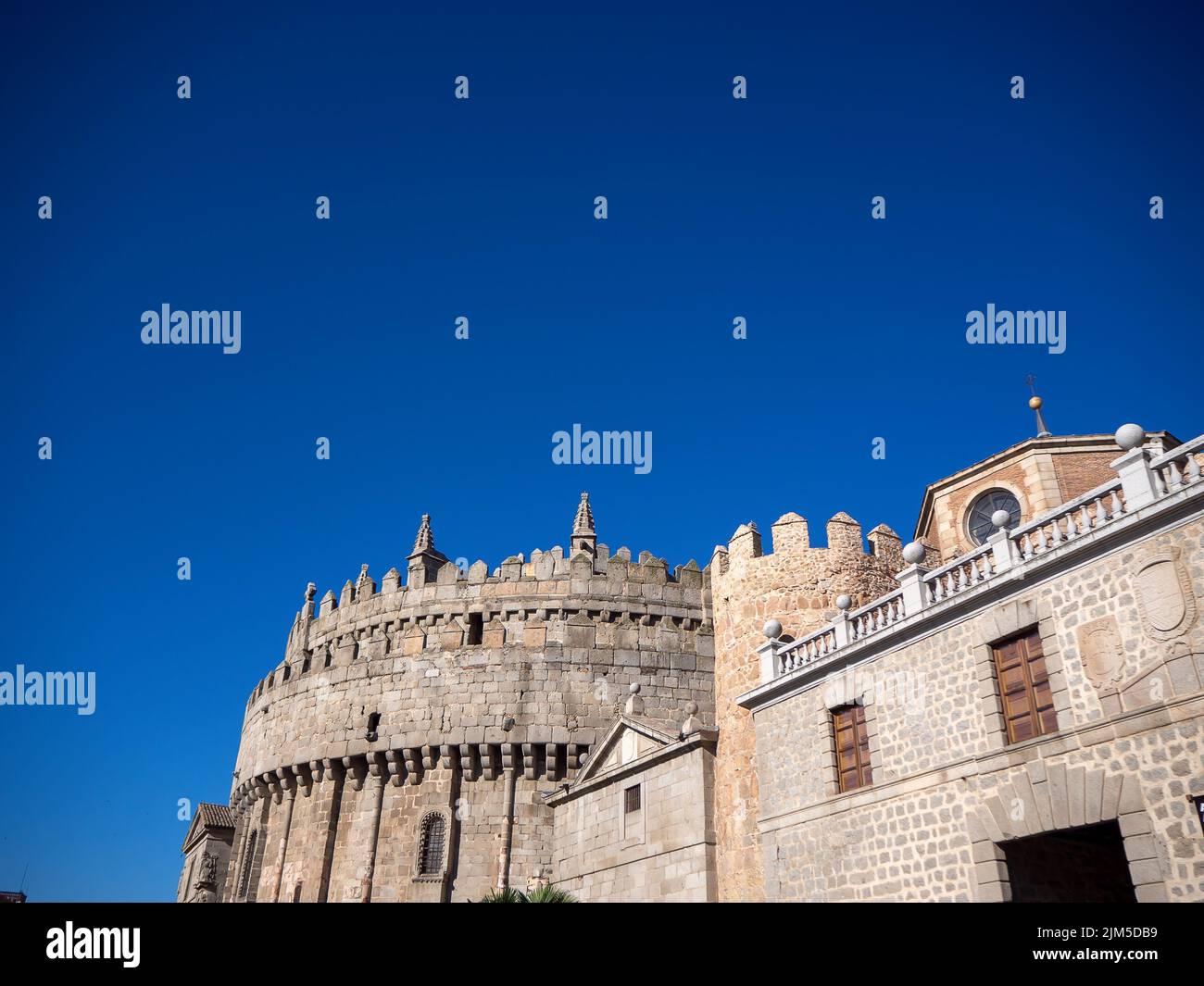The view of the Apse of the Cathedral of Avila against the blue sky ...