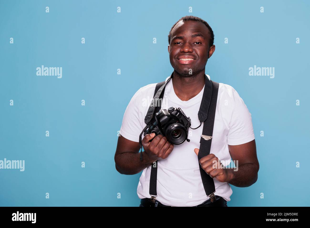 Cheerful african ethnicity photography enthusiast wearing trendy tshirt ...