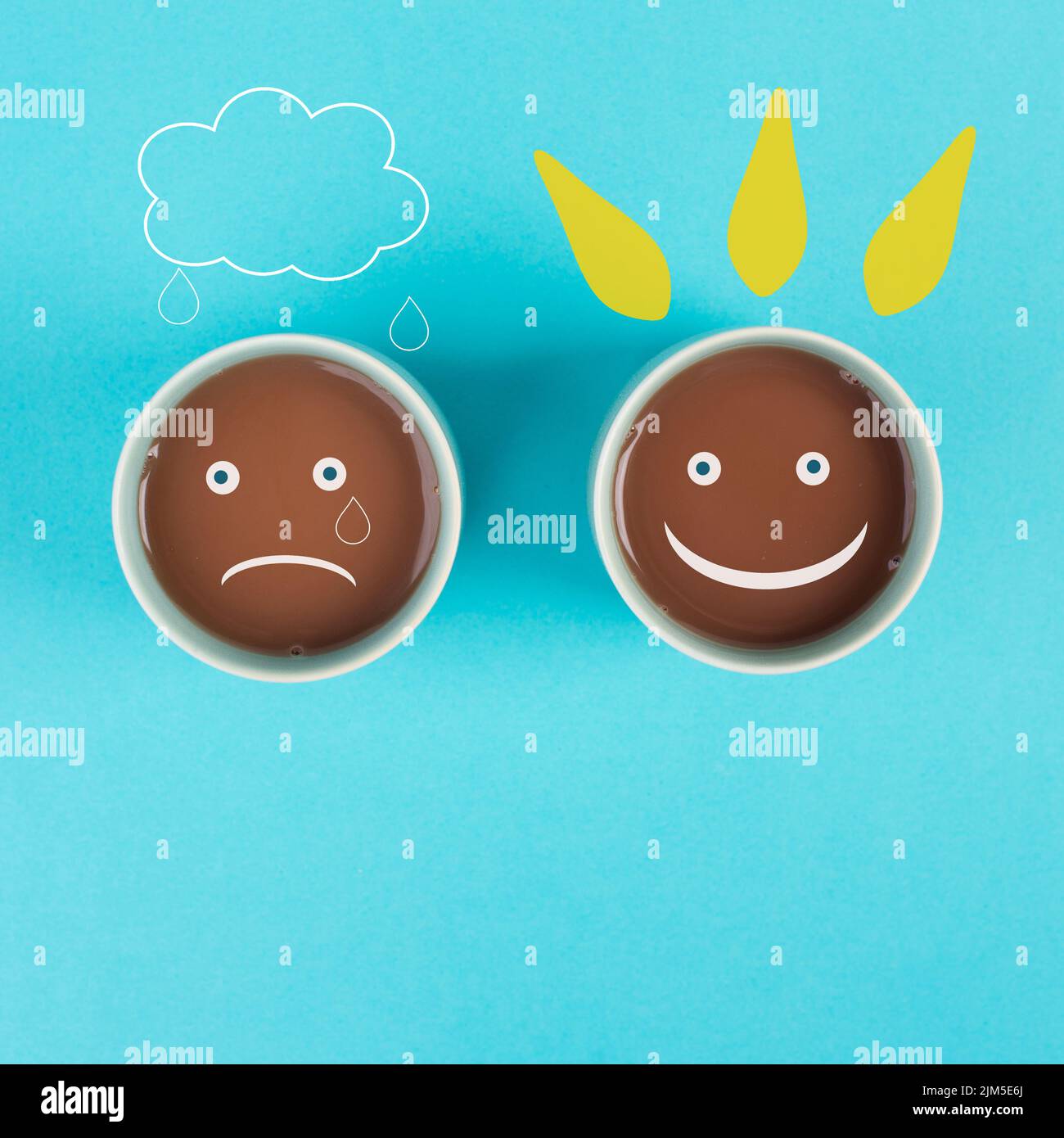 Cup of coffee with a sad and a happy face, positive and negative ...