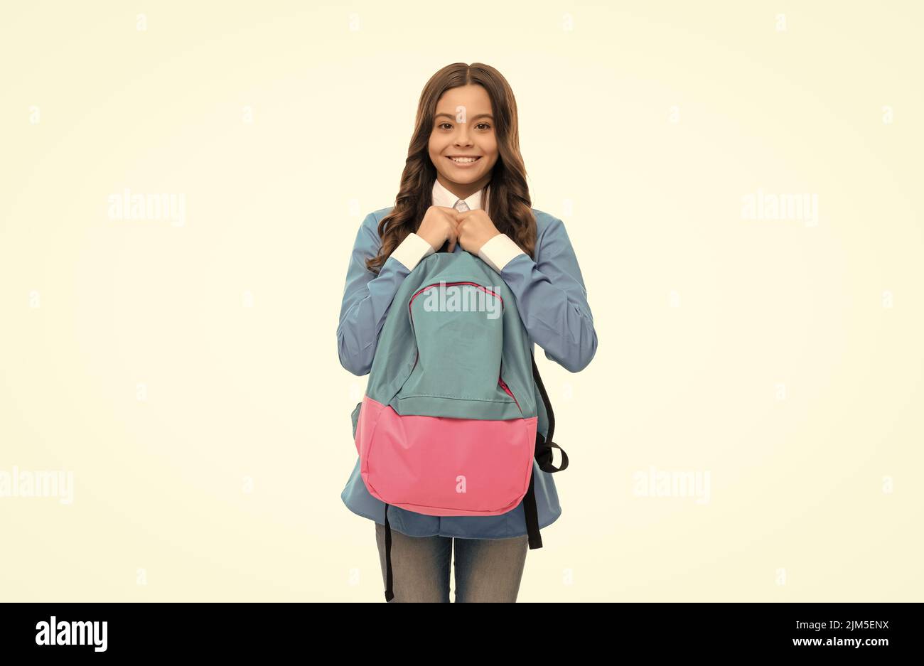 cheerful face of teen girl with long curly hair hold school bag ...