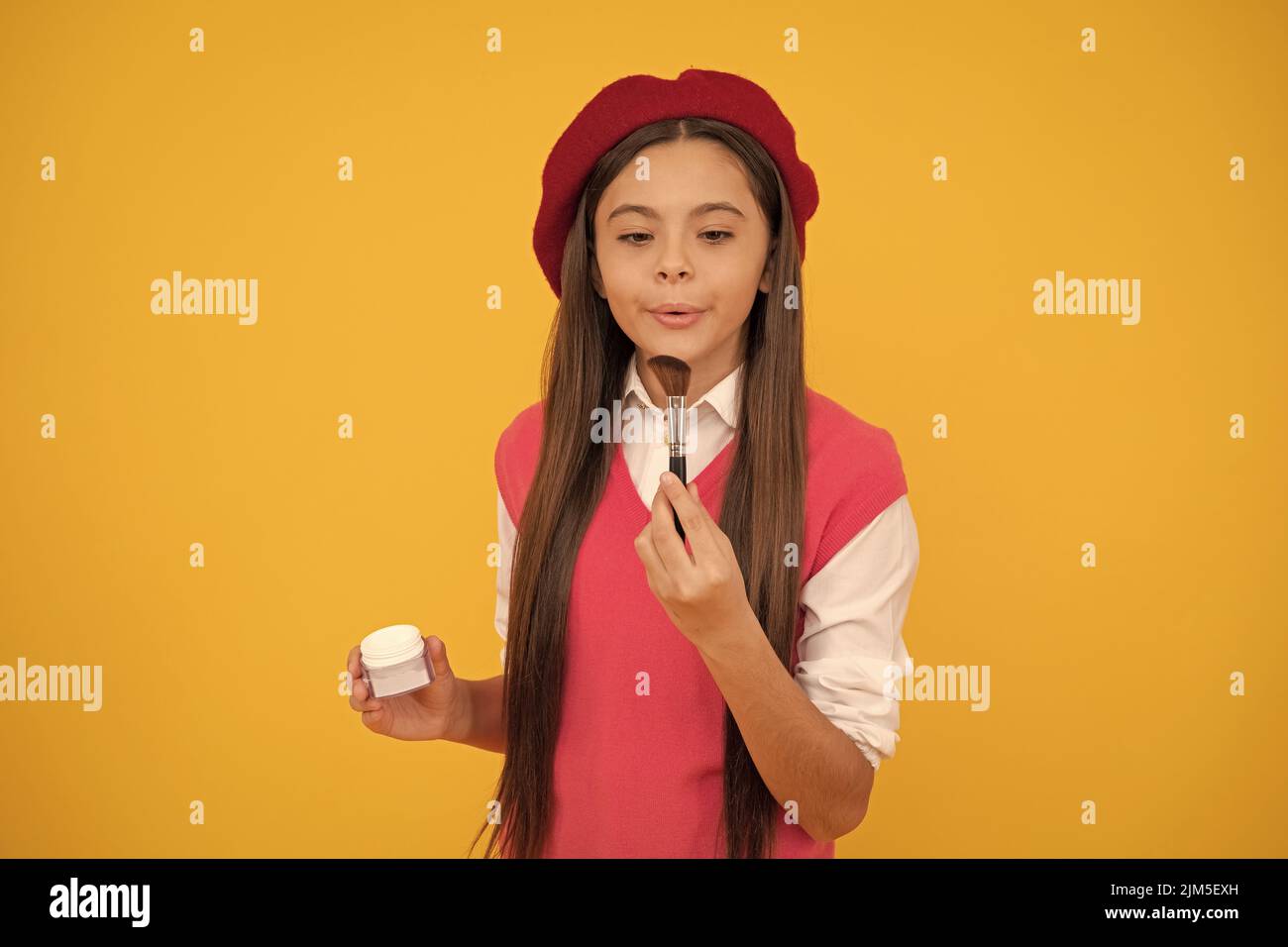 skincare and makeup. kid cosmetology. smiling child in beret use ...