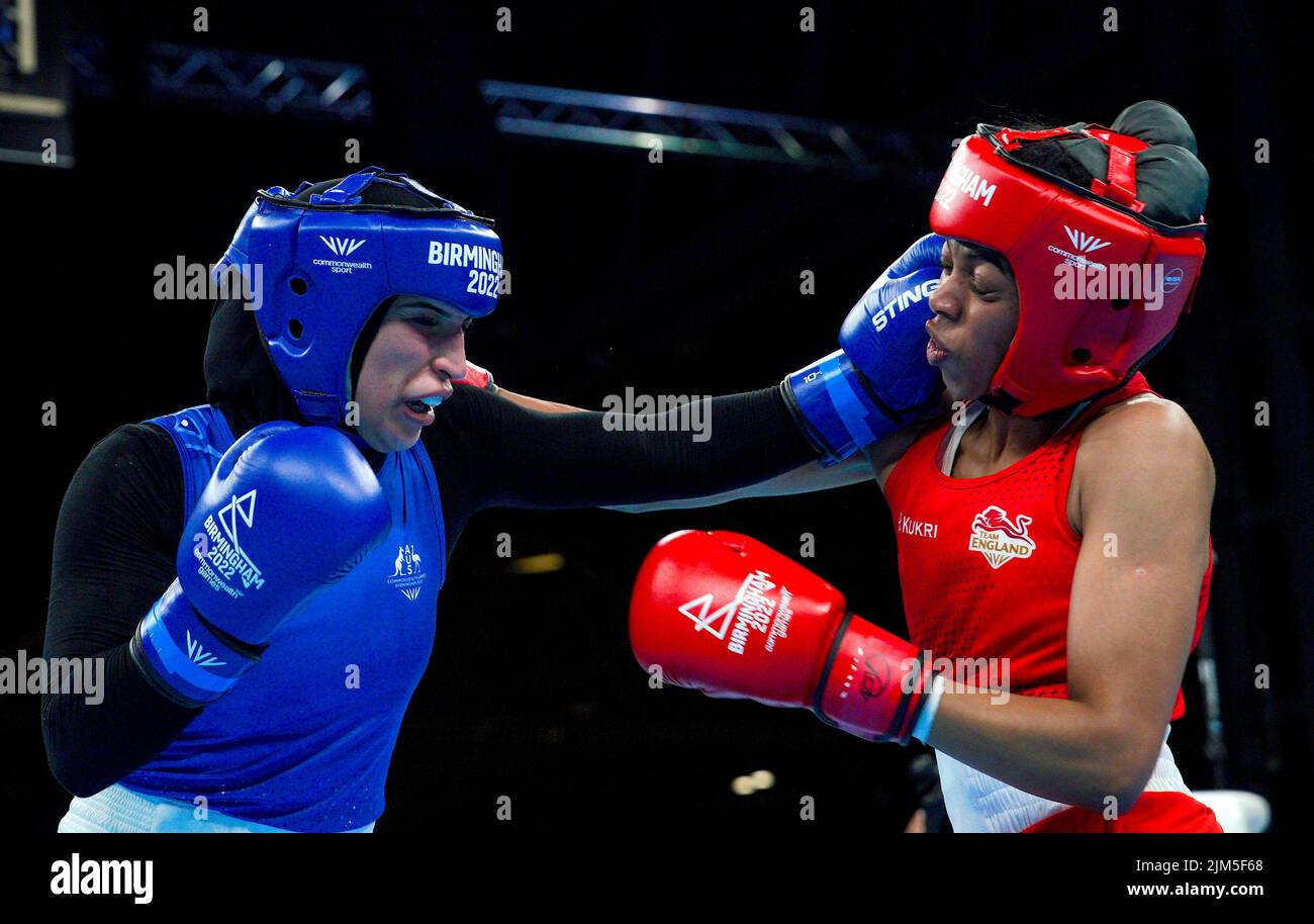 Australia's Tina Rahim (Blue) and England's Sameenah Toussaint (Red) in ...
