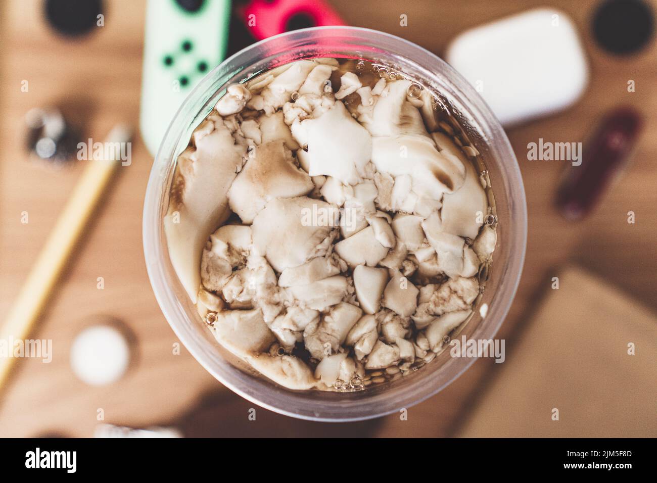 A top view of Taho food in a plastic cup on a blurry background Stock ...