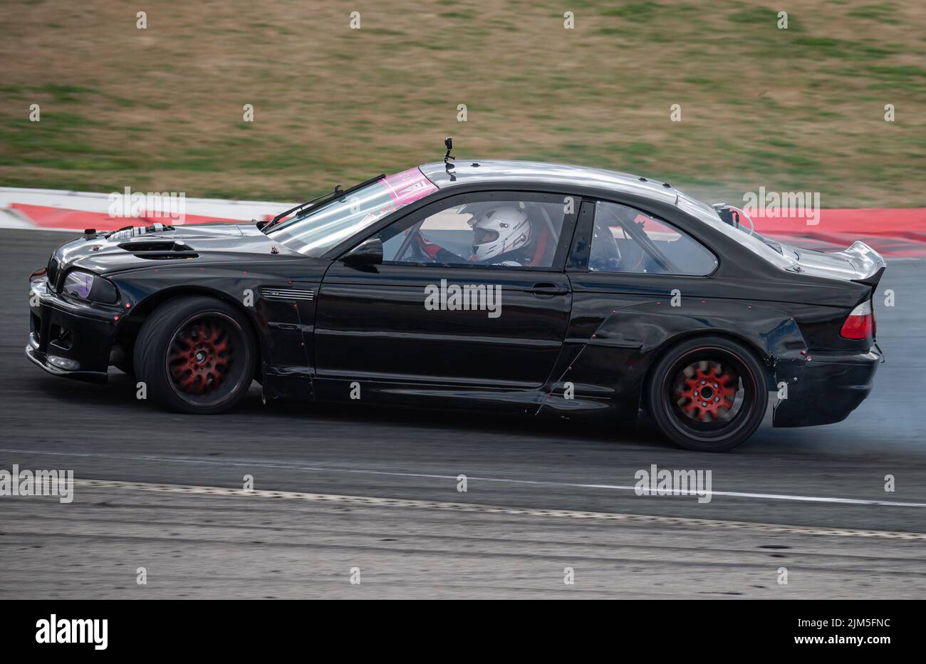 E46 drifting on the racing circuit Stock Photo - Alamy