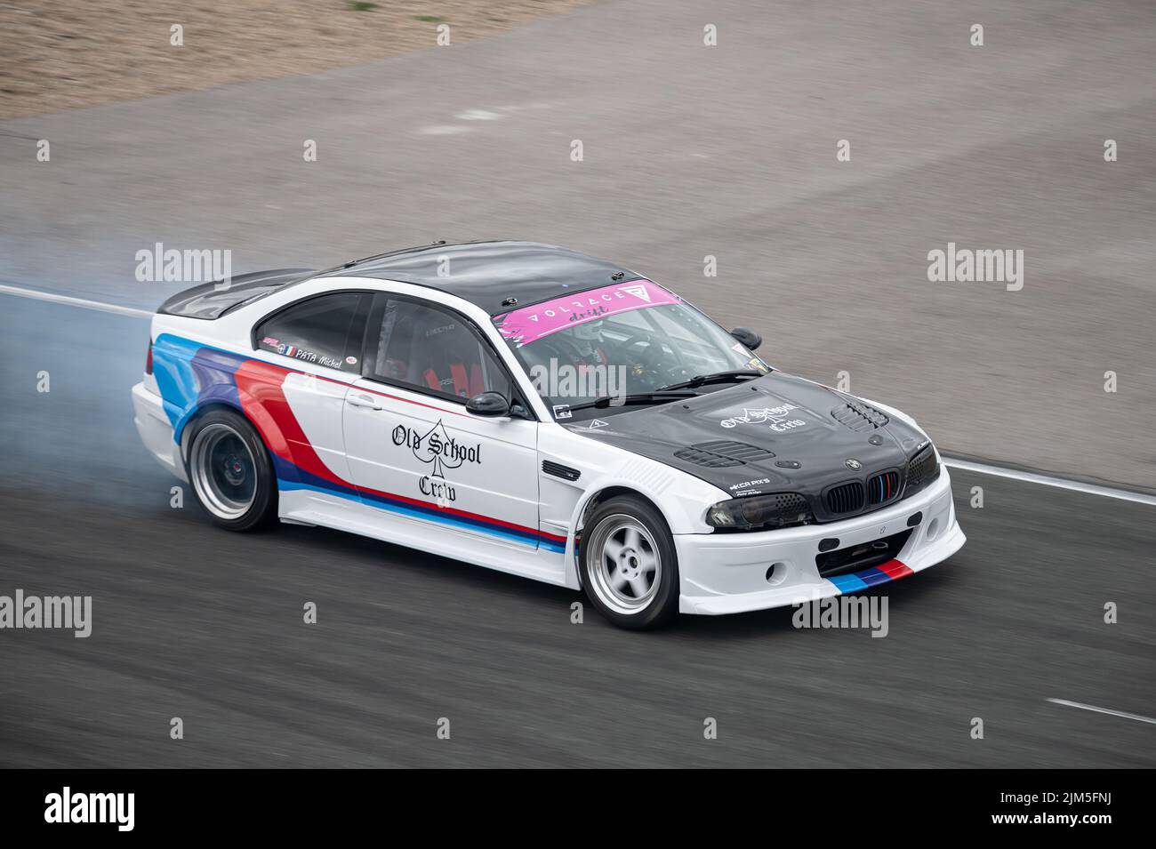 E46 drifting on the racing circuit Stock Photo - Alamy