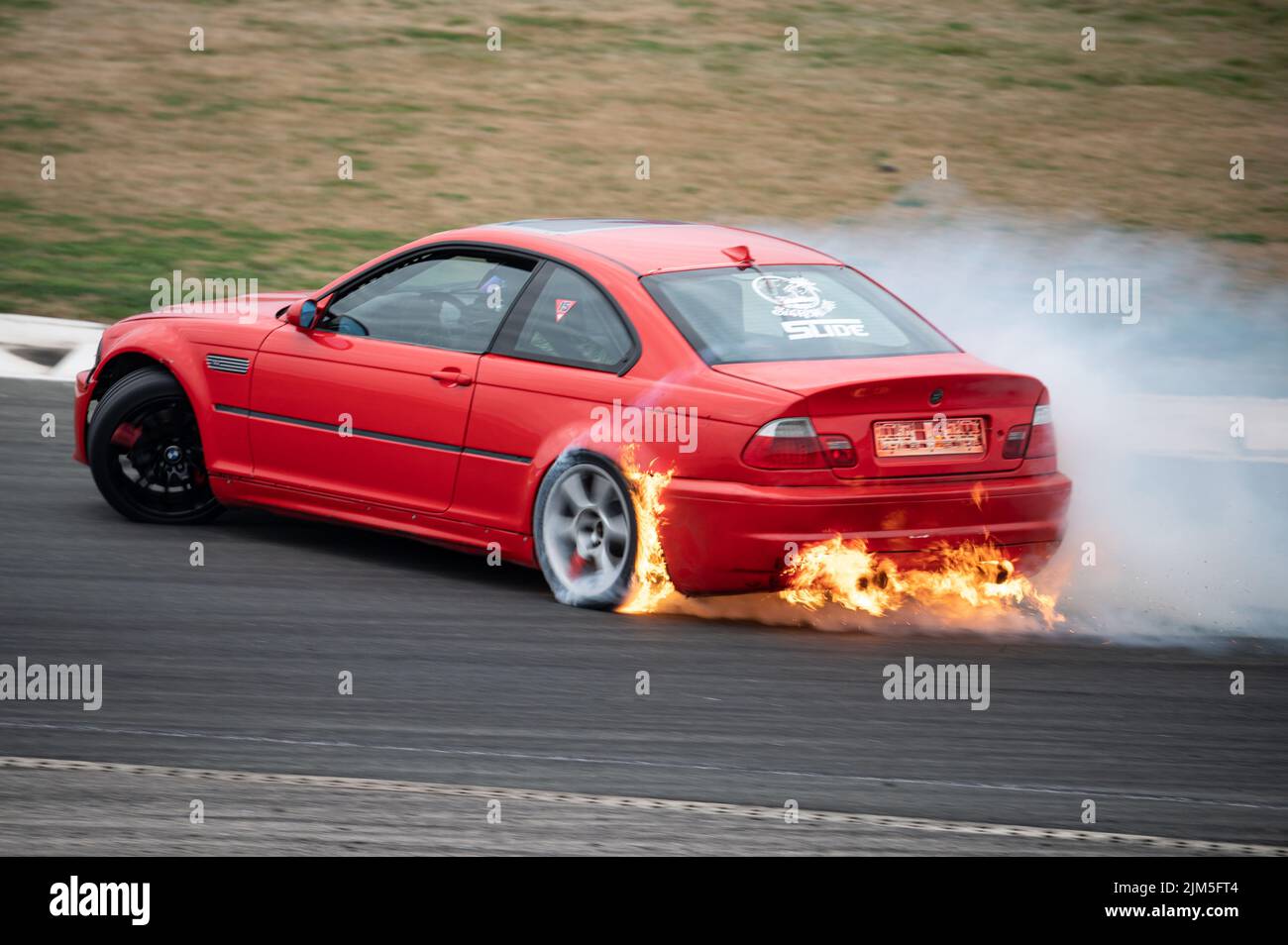 E46 drifting on the racing circuit Stock Photo - Alamy