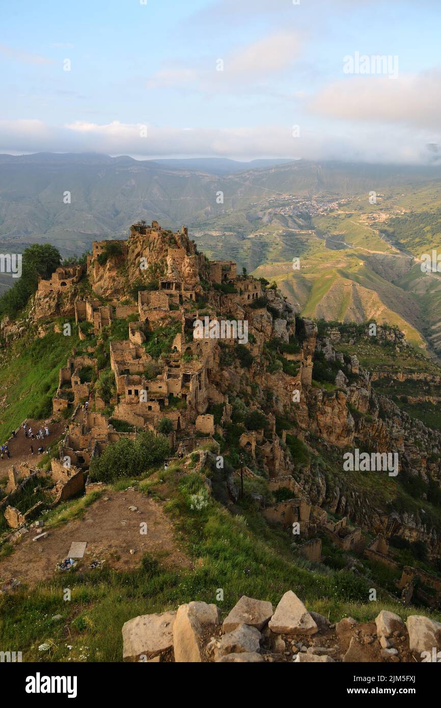 Ancient village Gamsutl on rock on background of mountains. Amazing ...