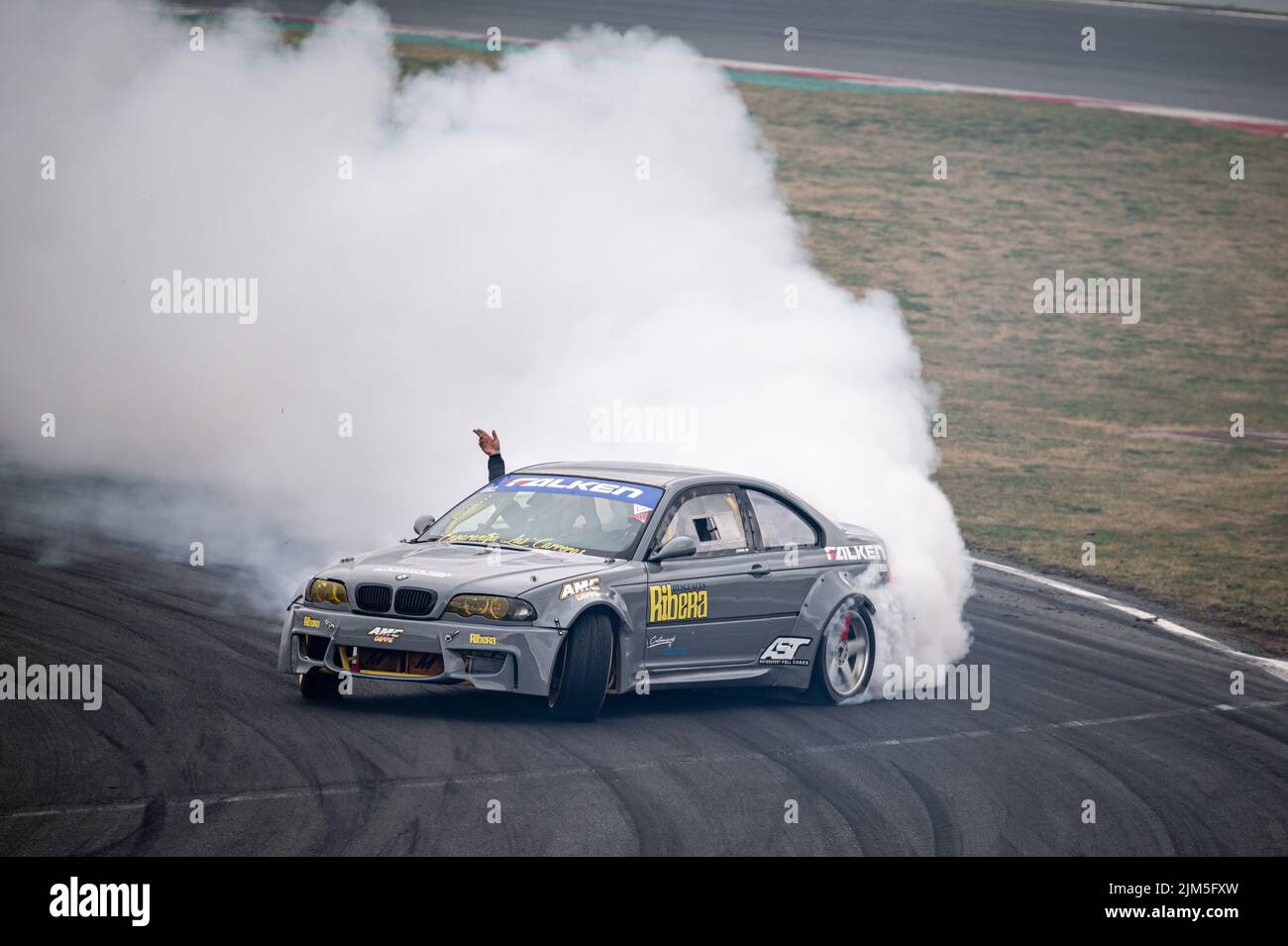 E46 drifting on the racing circuit Stock Photo - Alamy