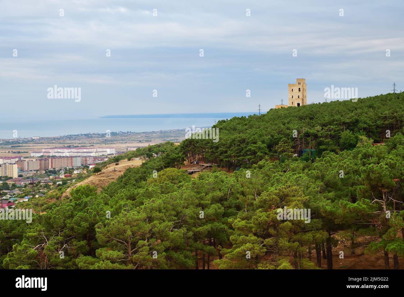 View on the pinery park, Caspian sea and modern district of Derbent ...