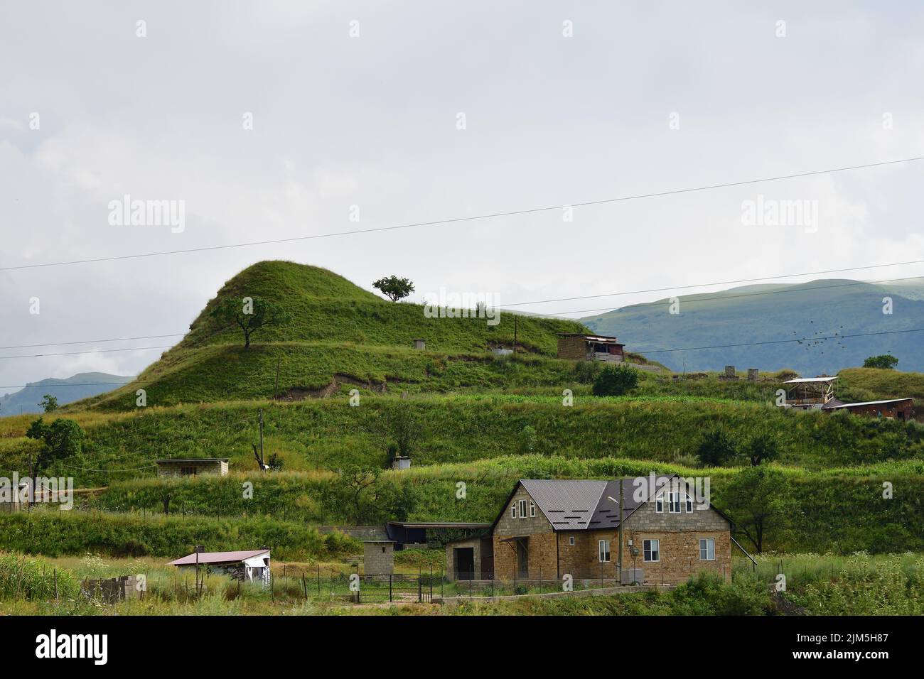 Man-made terraces and farmhouse. Fantastic landscape with mountain ...