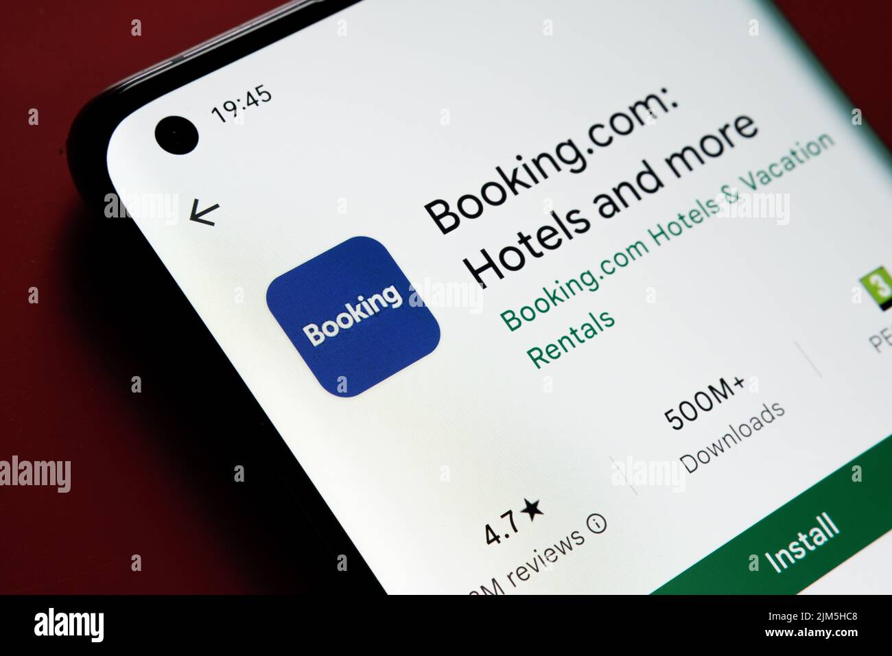 booking.com app seen in Google Play Store on the smartphone screen ...