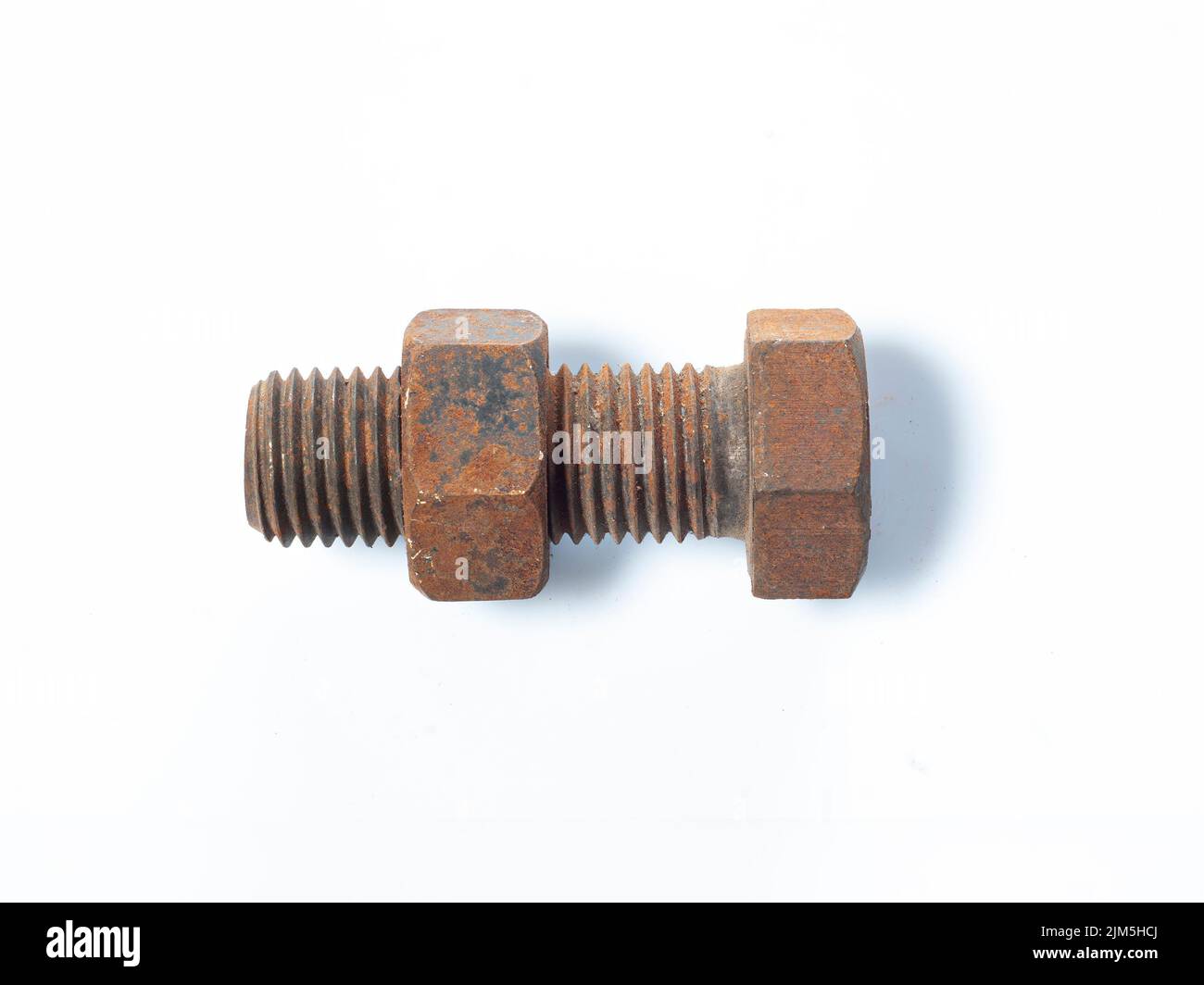 A Close-up of Old rusty nut and bolt isolated on white background Stock ...