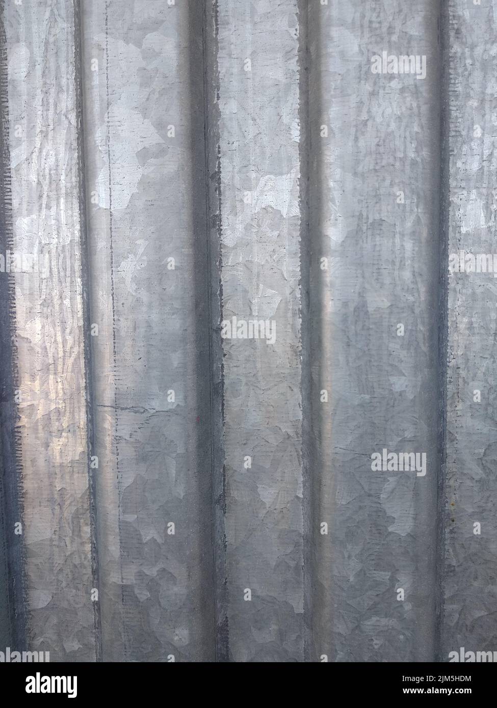 A closeup of a metal sheet texture background Stock Photo - Alamy