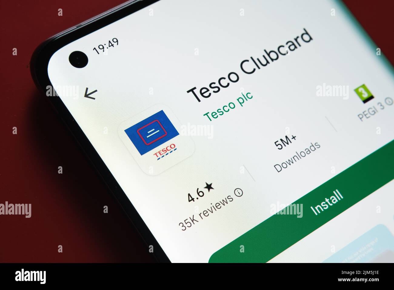 Tesco Clubcard app seen in Google Play Store on the smartphone screen ...