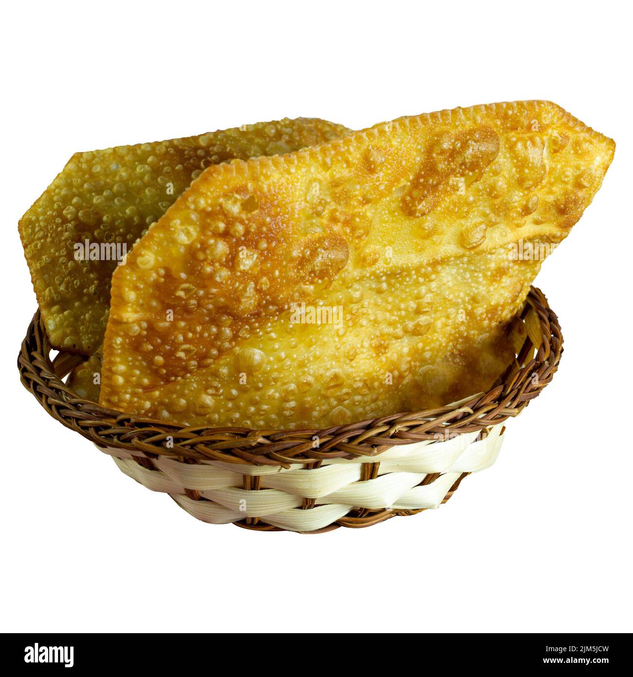 A brazilian pastel in basket isolated on white background Stock Photo ...