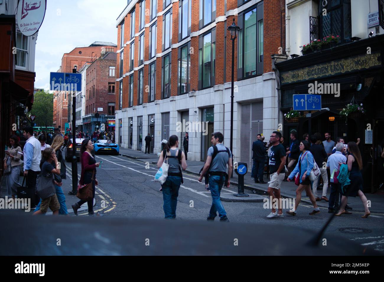 The people walking in the street in Soho, London Stock Photo - Alamy
