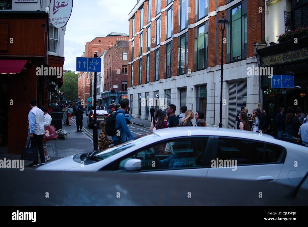 The people walking in the street in Soho, London Stock Photo - Alamy