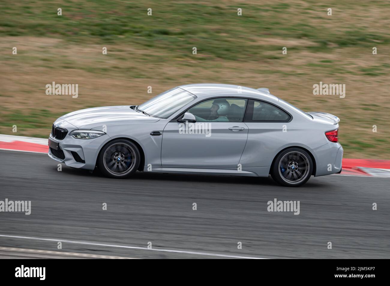BMW 2 Series F30 drifting on the circuit Stock Photo - Alamy