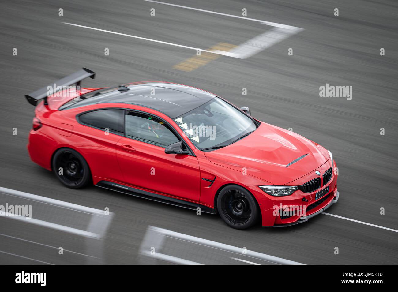 BMW F82 M4 GTS racing on the circuit Stock Photo - Alamy