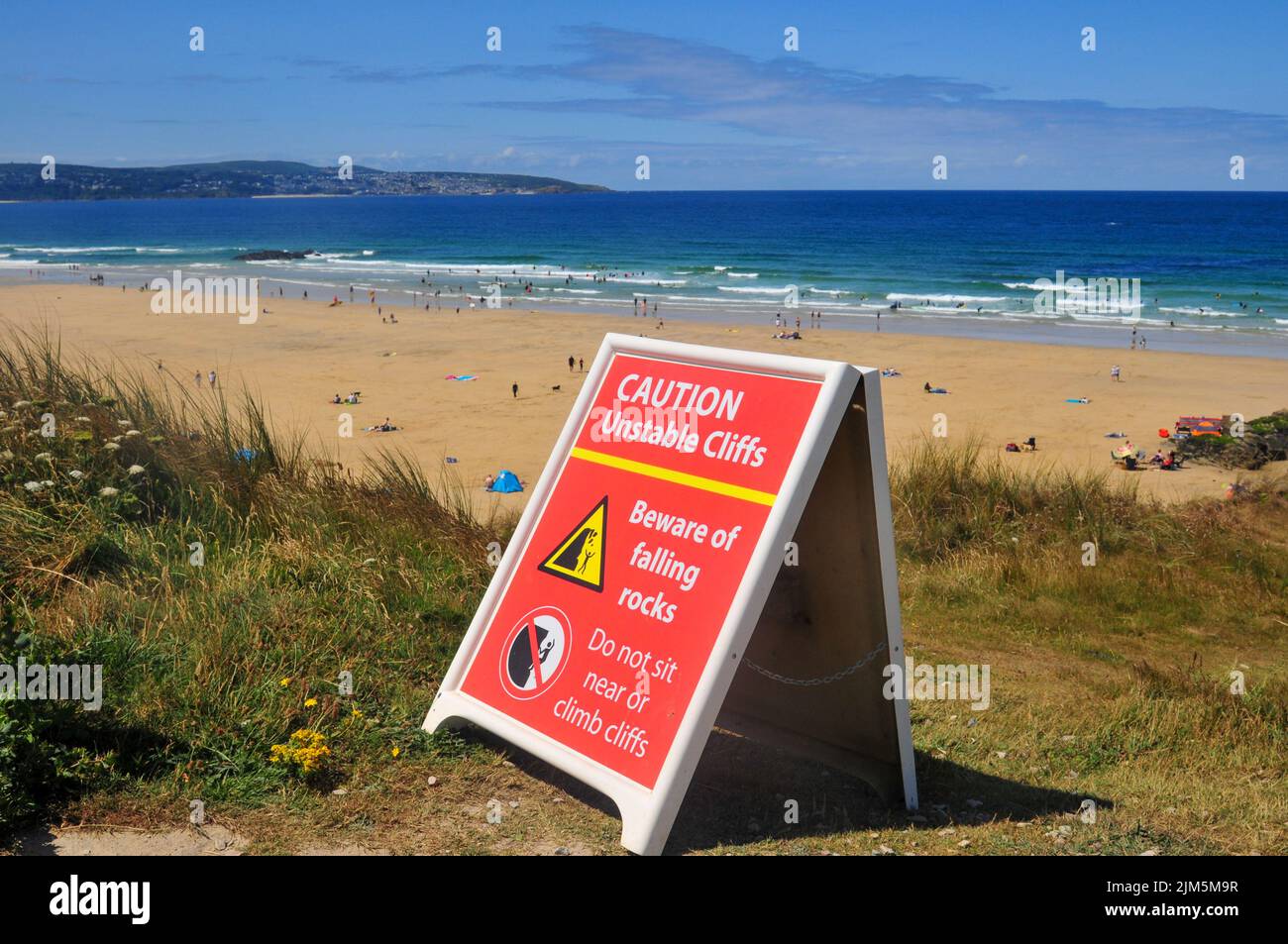 Unstable cliffs caution sign on Gwithian Beach, Cornwall,UK Stock Photo ...
