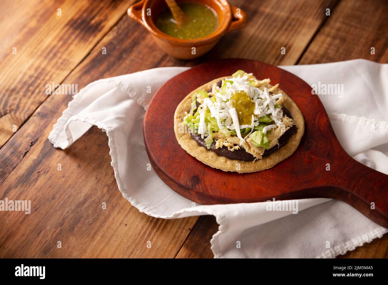 Sopes de Pollo. Traditional homemade Mexican appetizer prepared with ...