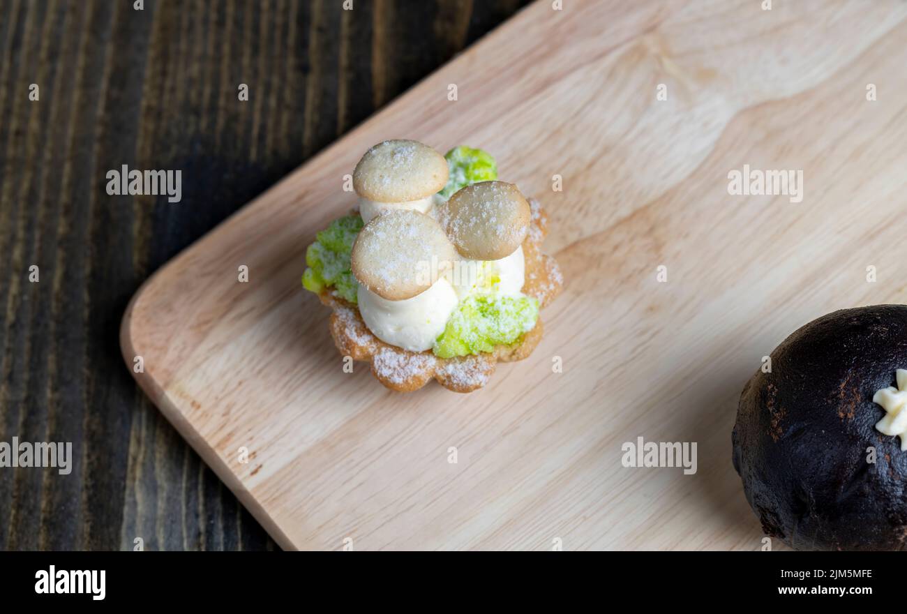sweet dessert mushroom shaped cake in a tartlet Stock Photo - Alamy