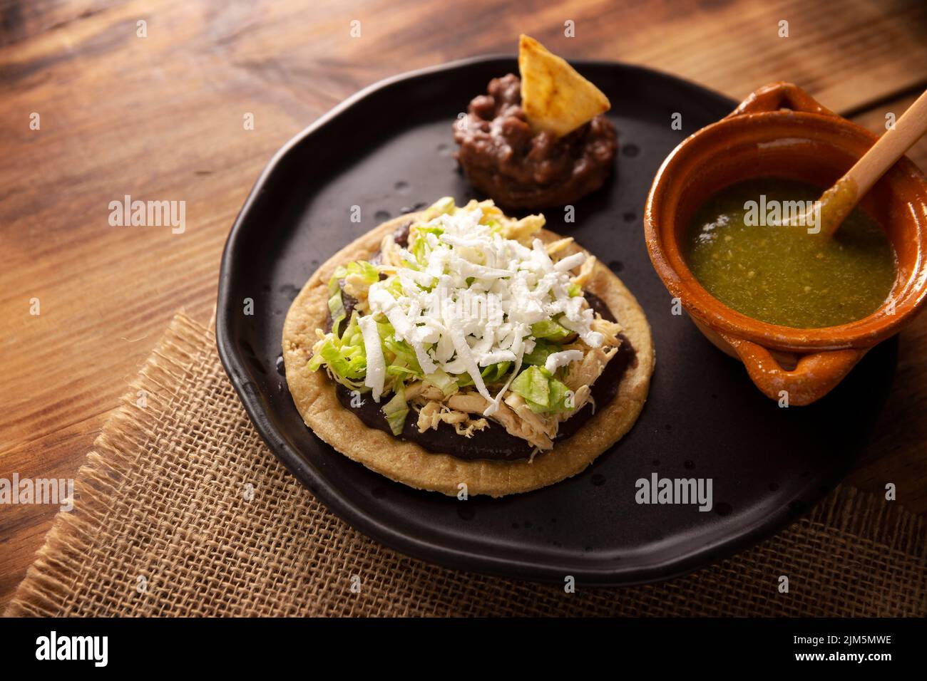 Sopes de Pollo. Traditional homemade Mexican appetizer prepared with ...