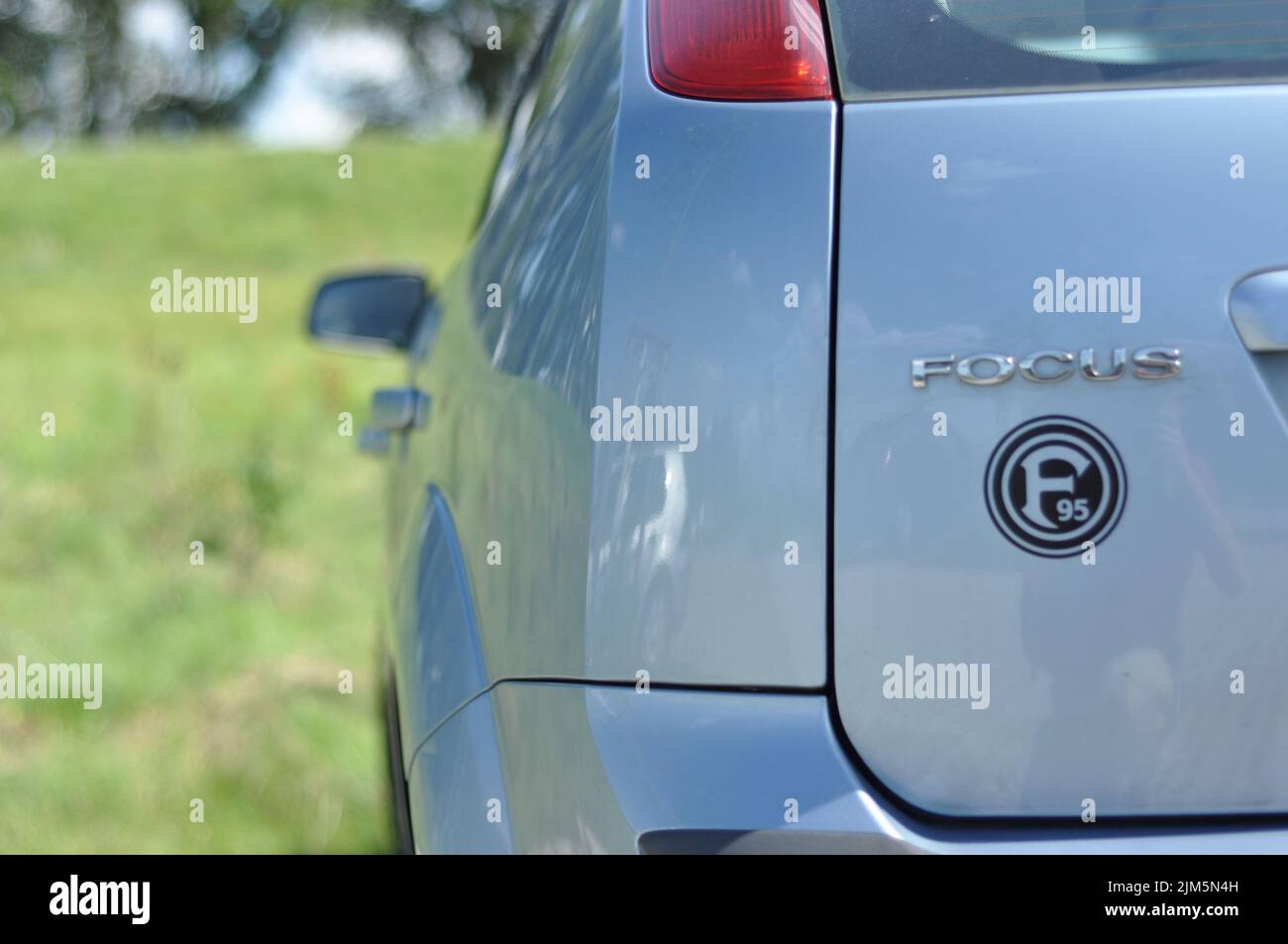 A closeup shot of the back of a blue Ford Focus MK2 with a Fortuna 95 ...