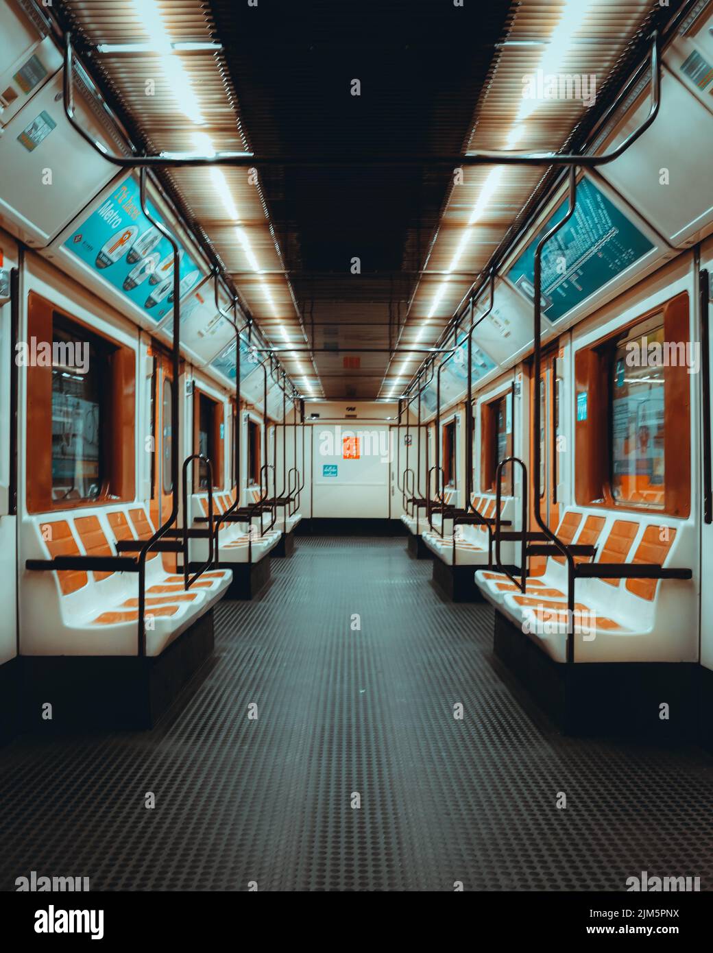 Inside a train carriage with free seats Stock Photo - Alamy