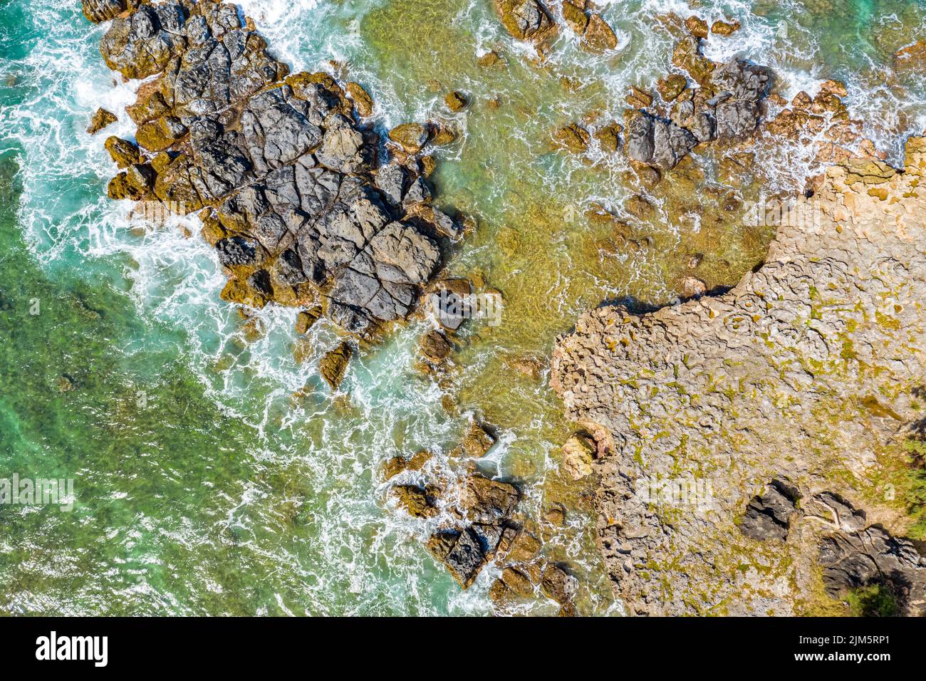 A bird's eye view of stones on the beach in Oahu, Hawaii Stock Photo ...