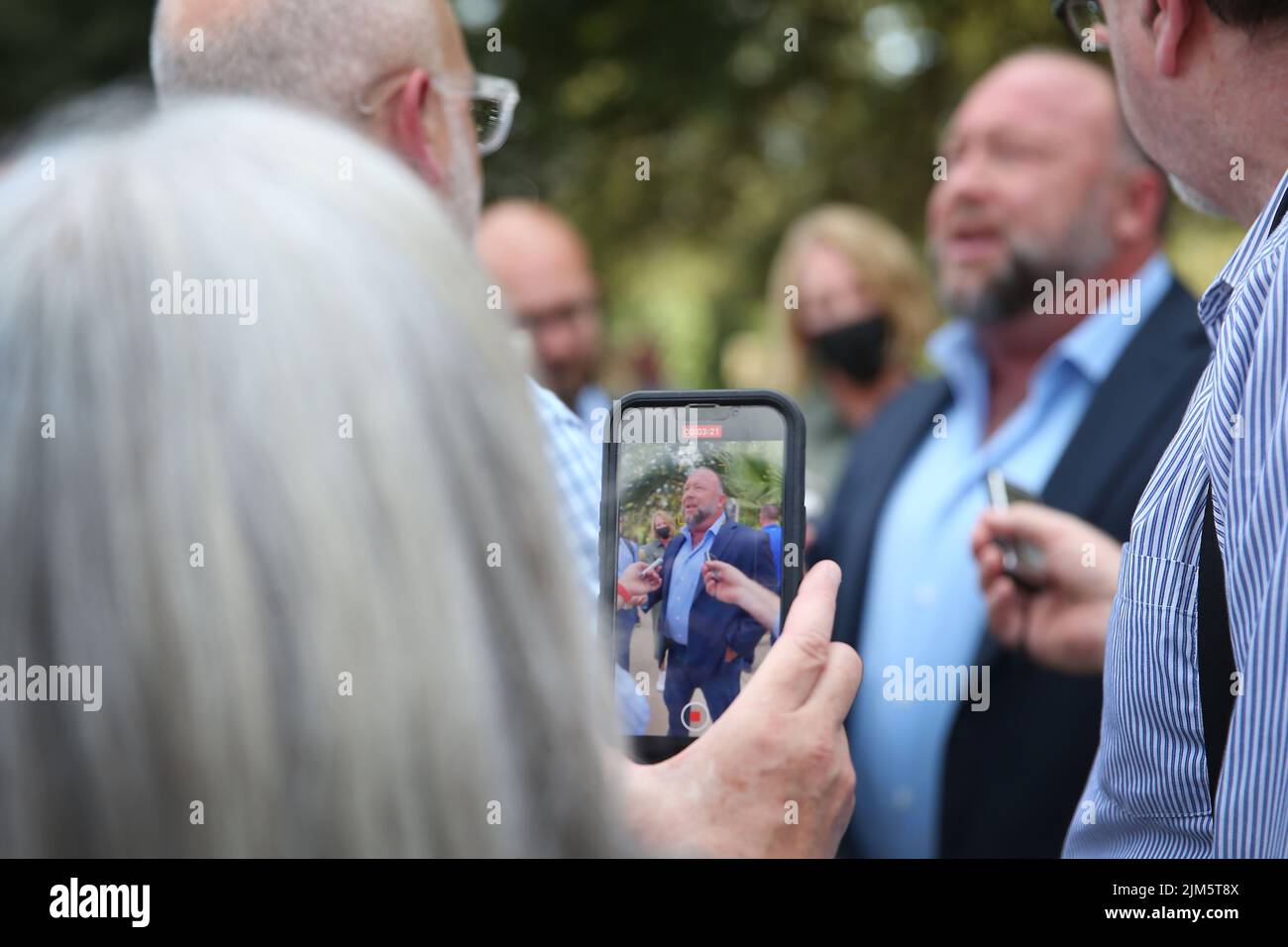 Austin, Texas, USA. 3rd Aug, 2022. ALEX JONES steps outside of the ...