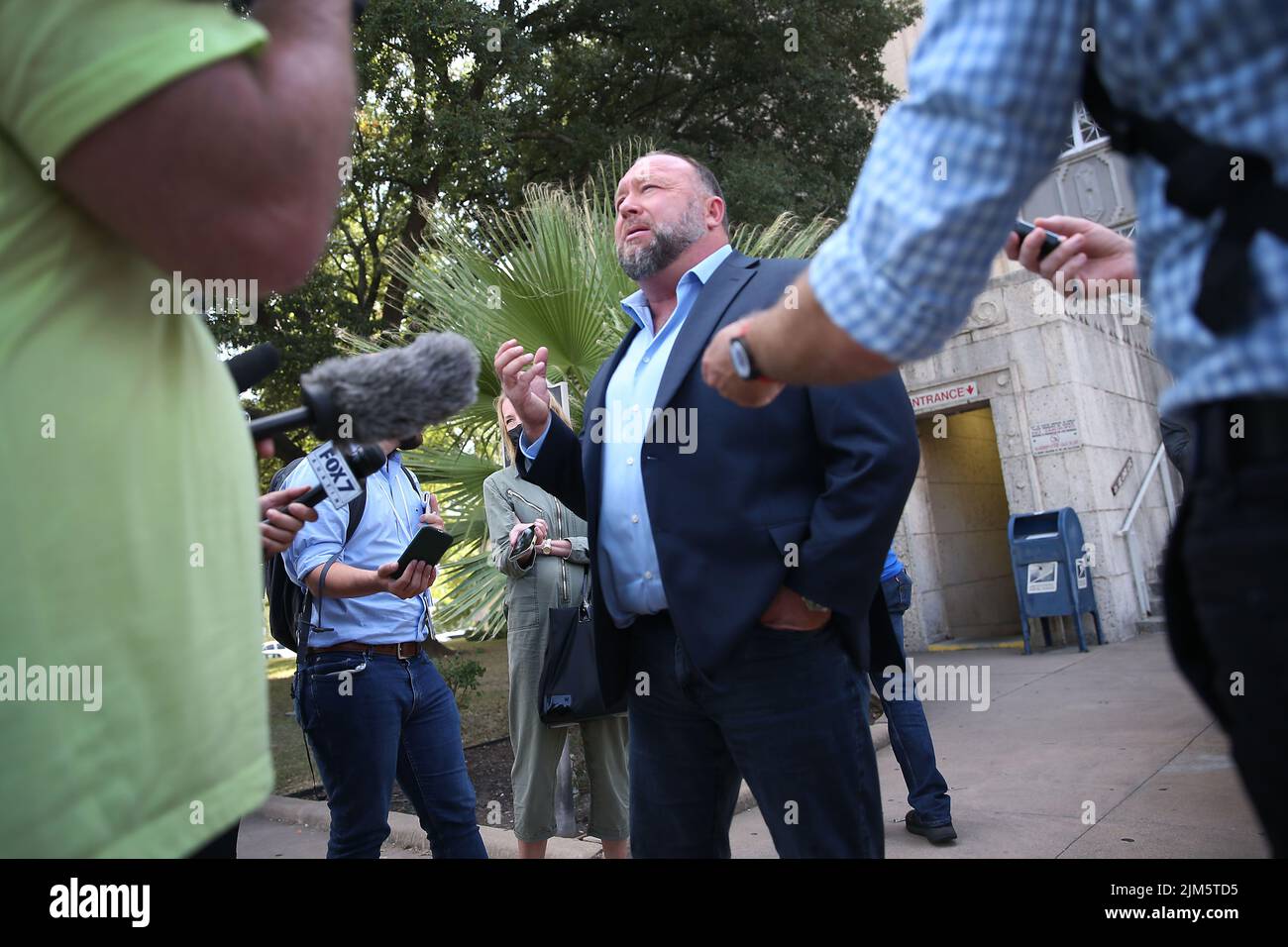 Austin, Texas, USA. 3rd Aug, 2022. ALEX JONES steps outside of the ...