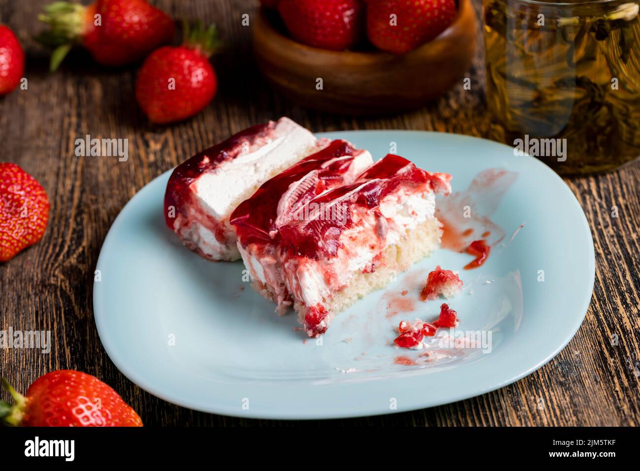 strawberry cream cheese cake with red sweet jam Stock Photo - Alamy