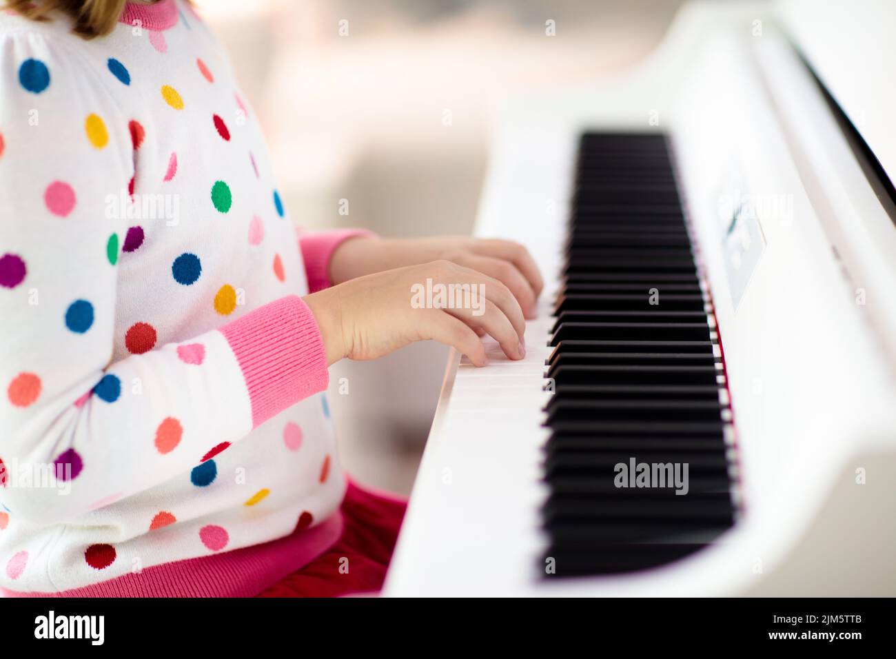 Child playing piano. Kids play music. Classical education for children ...