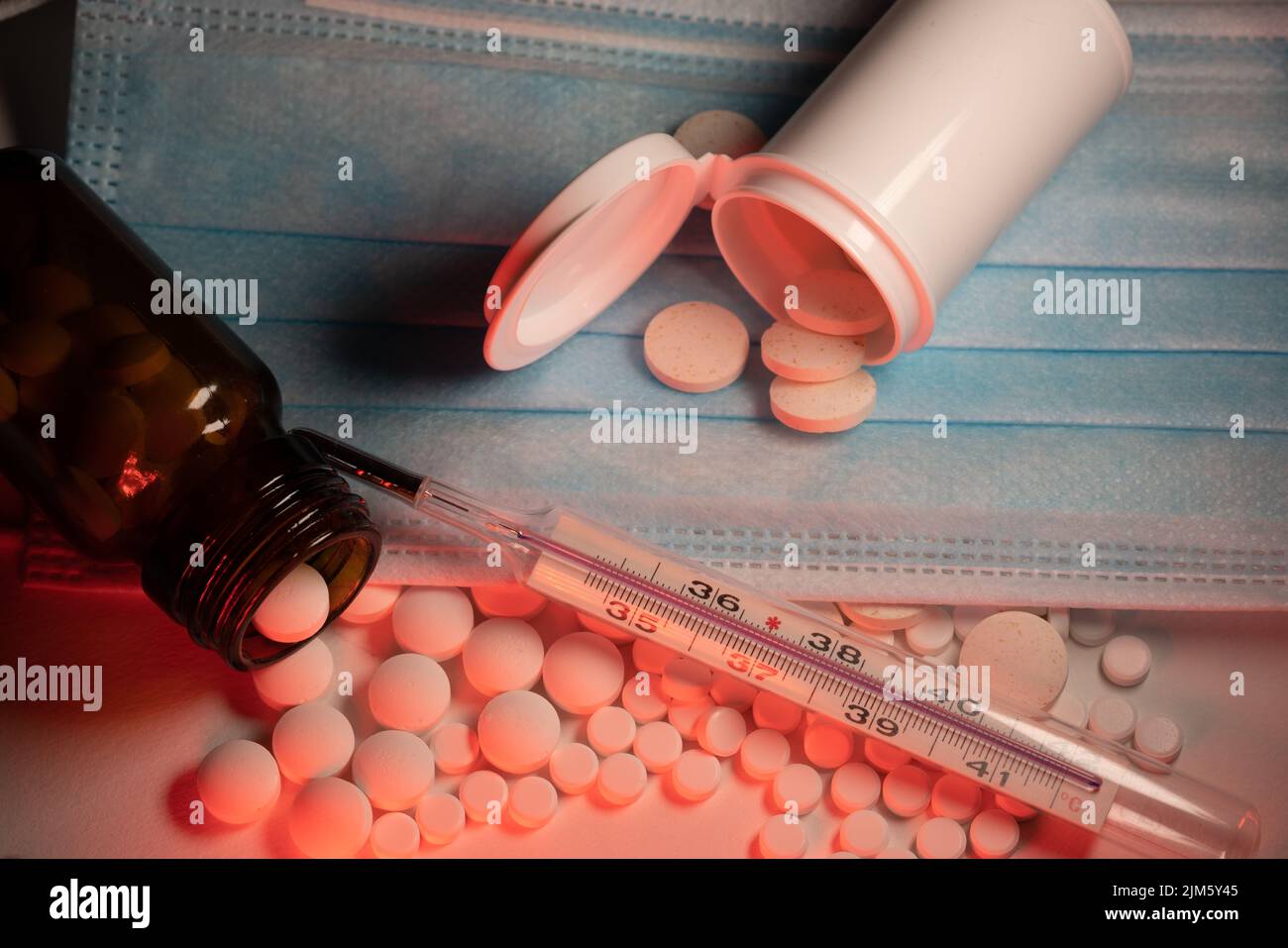 Blue Clinical mask with glass mercury rising Thermometer. Diagnostic ...