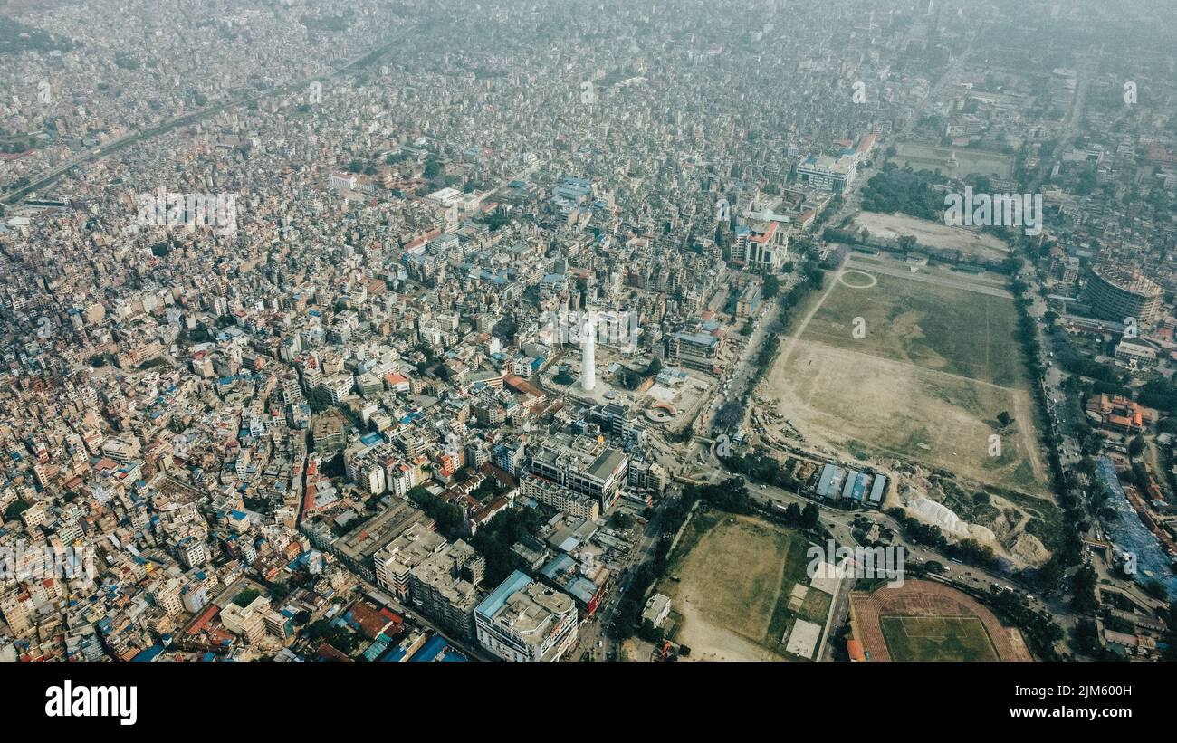 An aerial view of the cityscape of Kathmandu in bright sunlight, Nepal ...