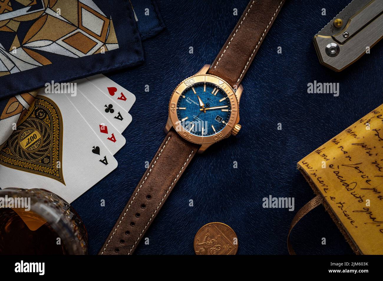 A top view of Christopher Ward C60 Trident Bronze Watch surrounded by ...